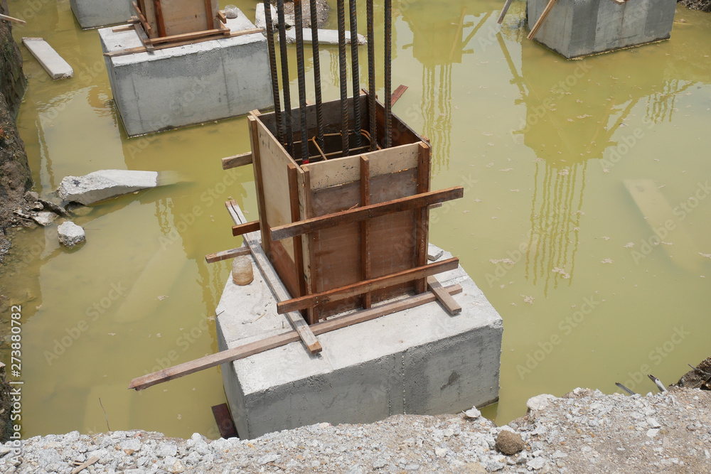 Pile cap and column stump under construction at the construction site ...