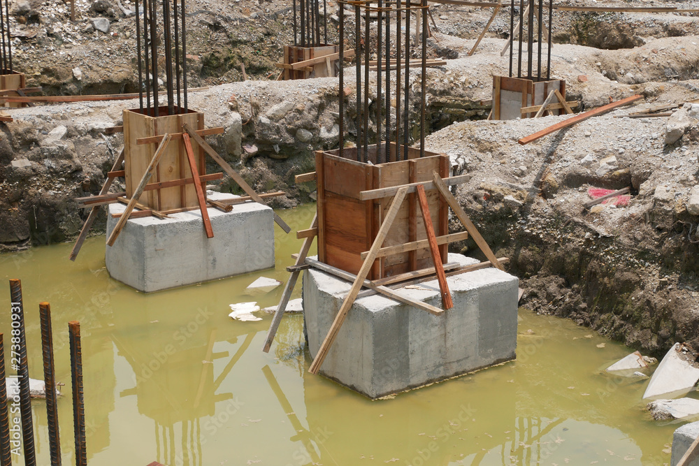 Pile cap and column stump under construction at the construction site ...