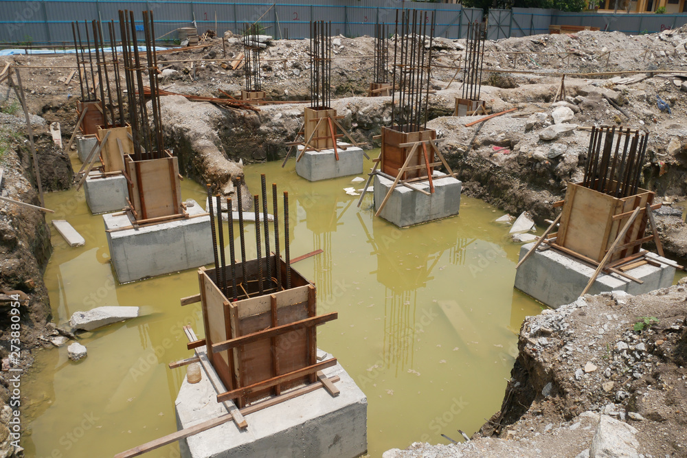 Pile cap and column stump under construction at the construction site ...