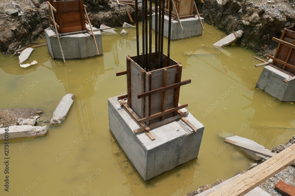 Pile cap and column stump under construction at the construction site ...