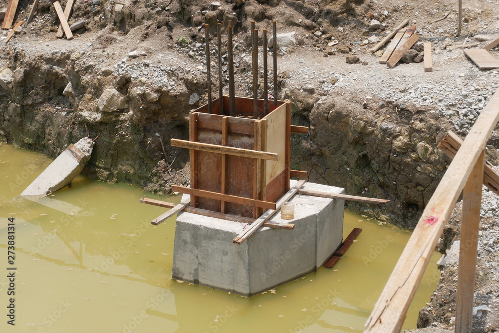 Pile cap and column stump under construction at the construction site ...