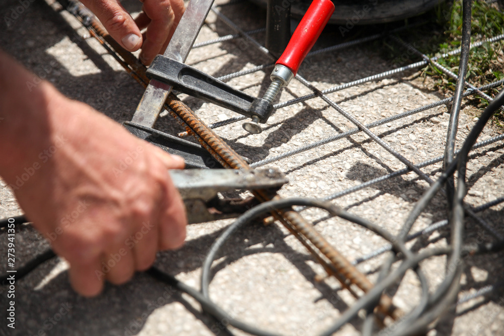 Experienced man welder apparatus and electrodes welded and assembled ...