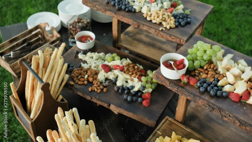 Catering service. Station with a large assorted cheese Cheddar ...