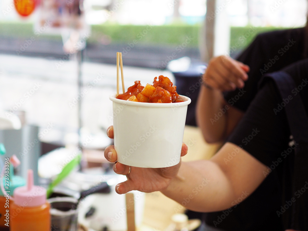 Disposable cup of Tteokbokki, also known as topokki; a famous Korean ...