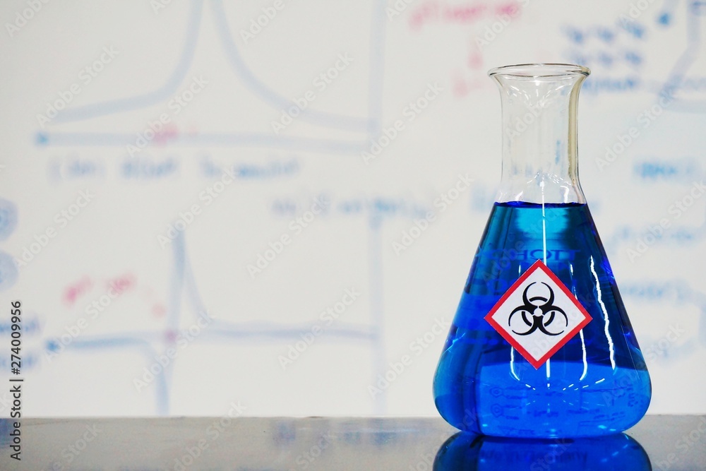 Erlenmeyer flask with Deep Blue liquid and chemical hazard warning ...