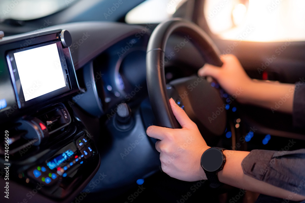 Male driver hand holding on steering wheel using digital dashboard ...