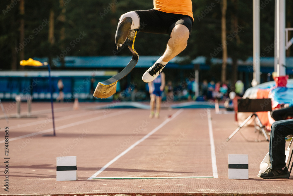 athlete amputee on prosthetic leg long jump competition at athletics ...