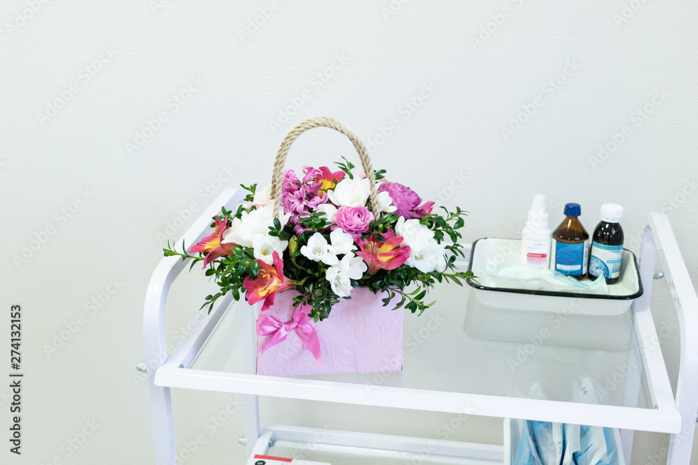 flowers on medicine table. medical equipment.doctor's office. medical ...