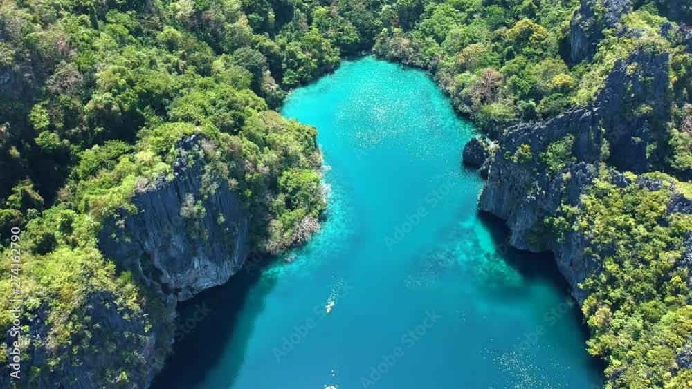Cinematic aerial of big lagoon, small lagoon, El nido, Palawan ...