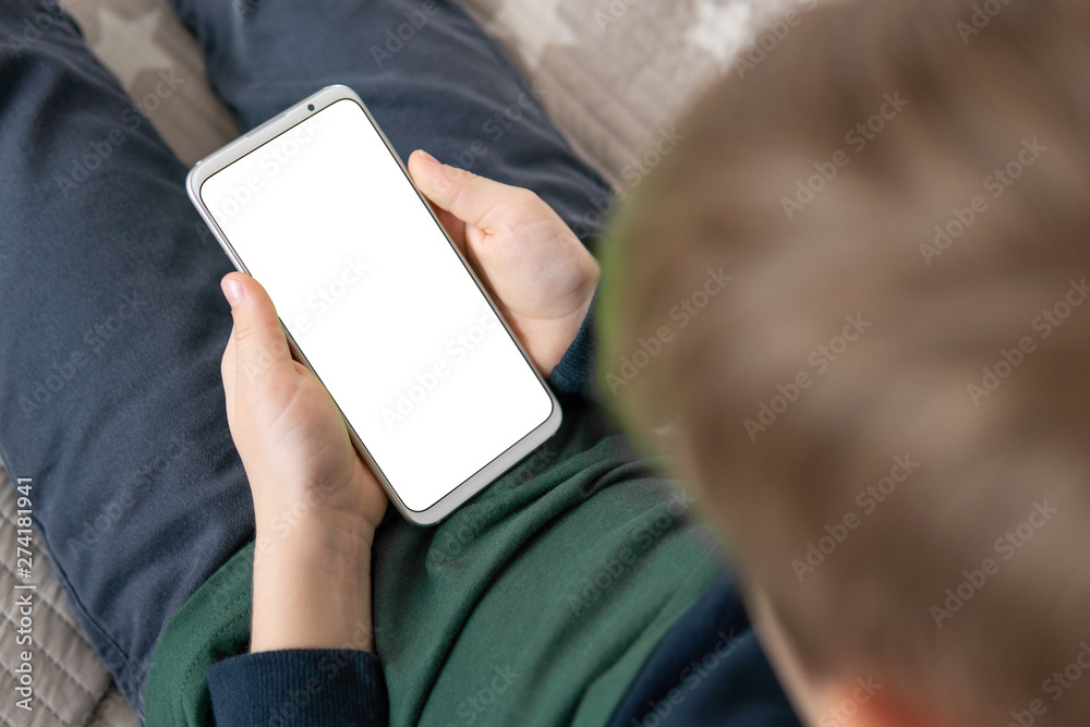 Phone a for mock up is holding kid. Smartphone with a white screen in ...