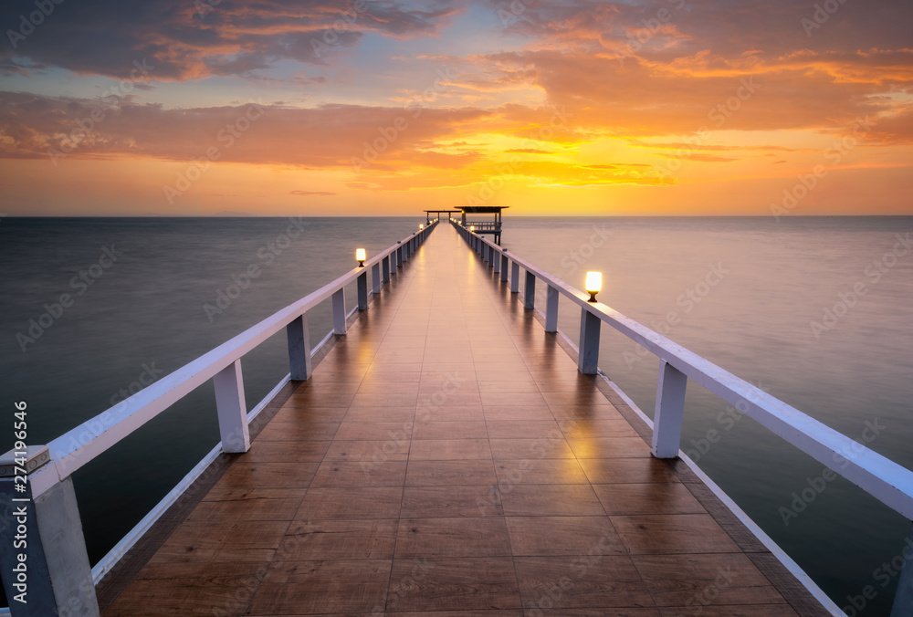 bridge with sunset, background for travel, sea, beach and resort ...