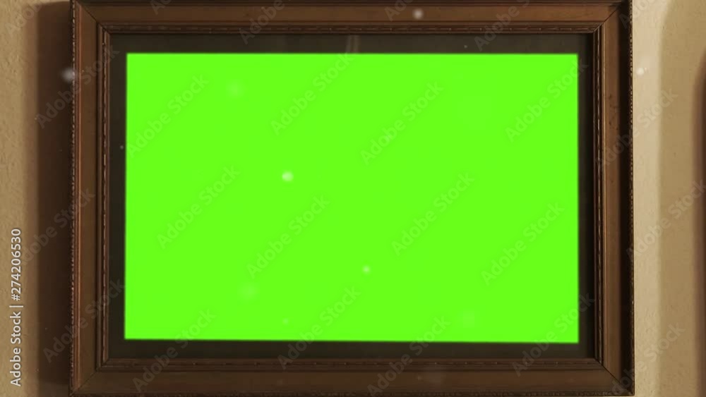 Old Wooden Frame with Green Screen. Pollen Particles. You can replace ...