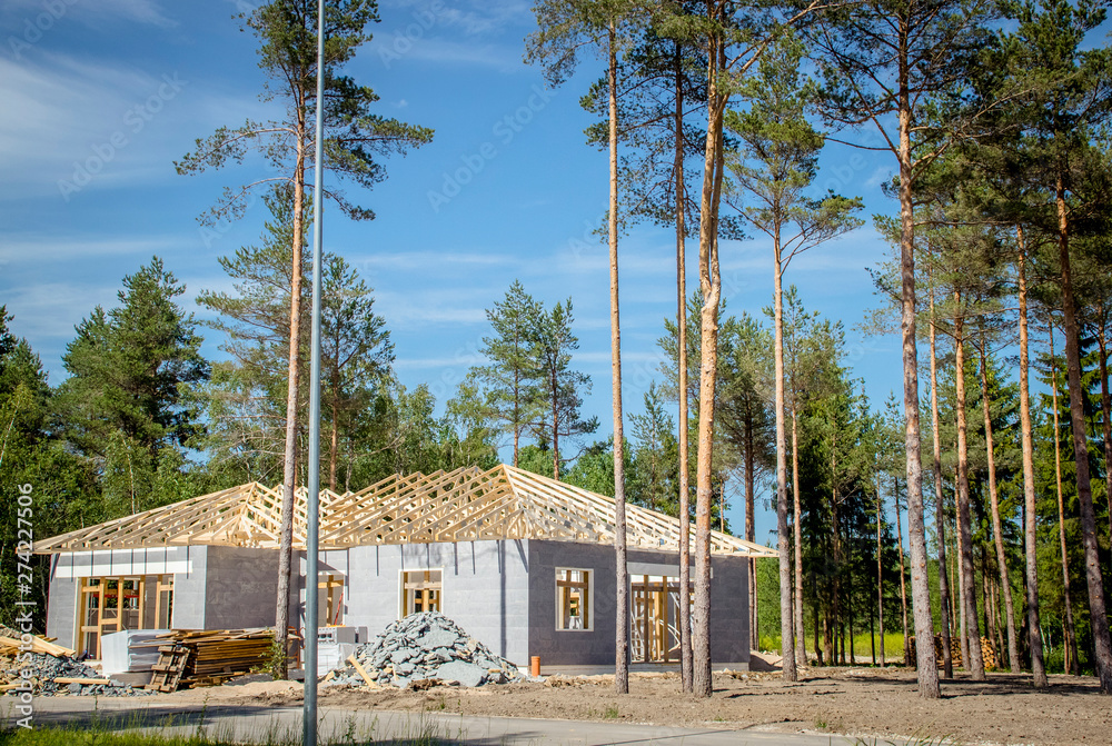 Private home house being built, work in progress, gray brick walls up ...