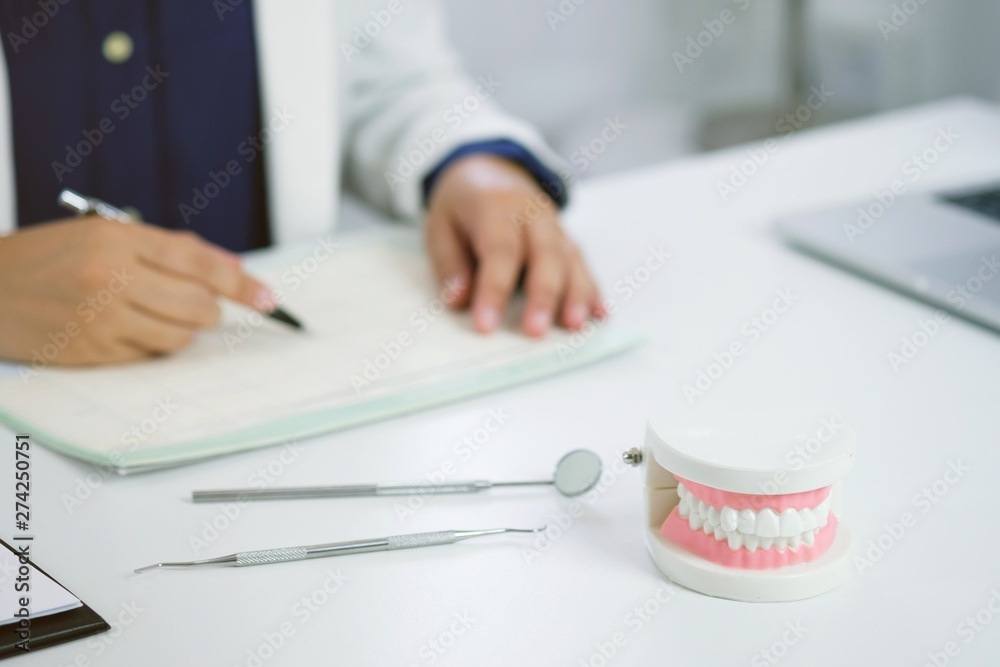 Dentist examining a patient teeth medical treatment at the dental ...