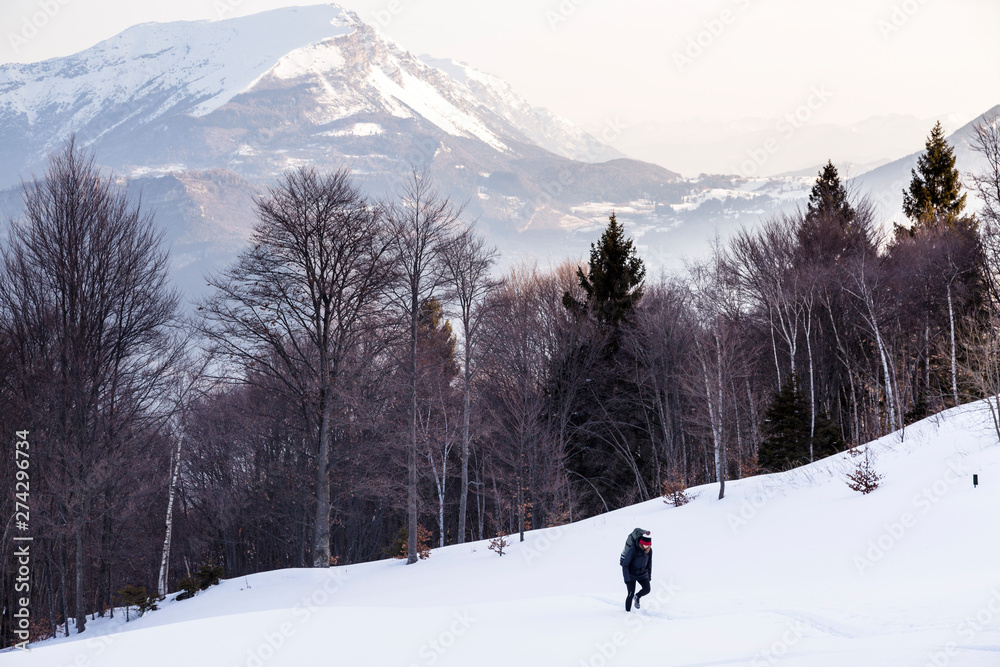 Nago near Lake Garda, Trento, Italy: A female backpacker making her way ...