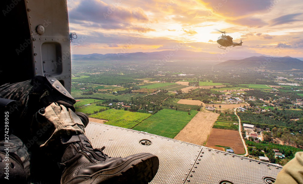 Thai Army soldiers prepared jumping from the helicopter at the open ...