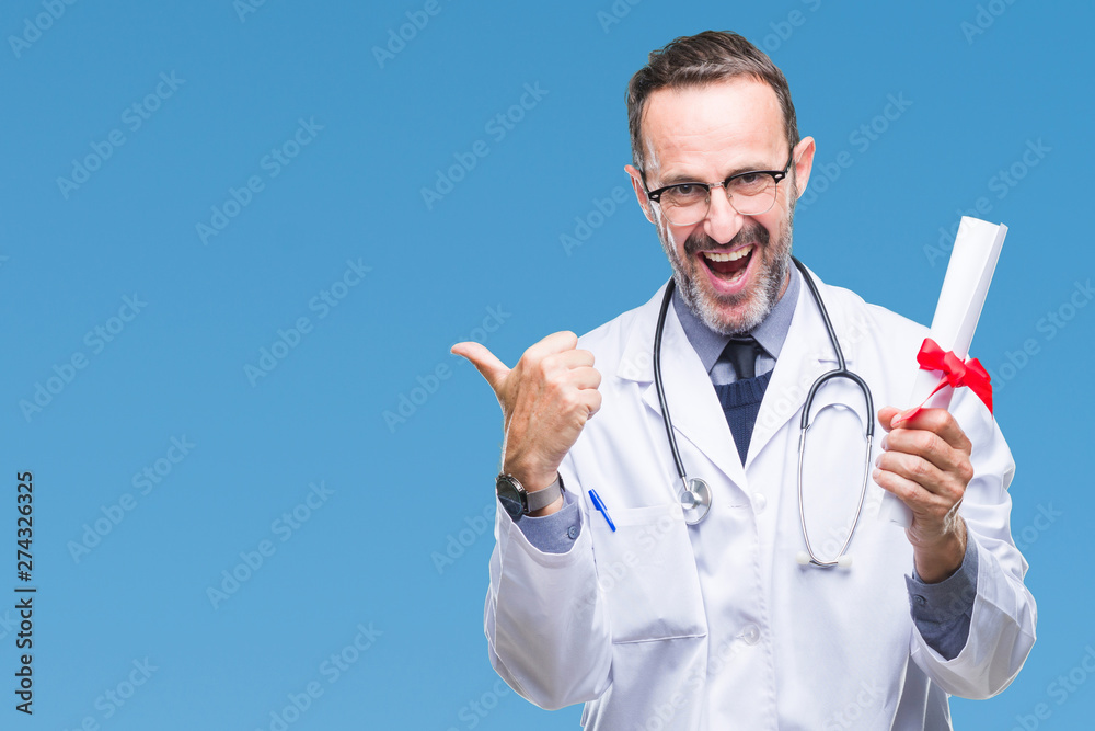 Middle age senior hoary doctor man holding degree certificate over ...