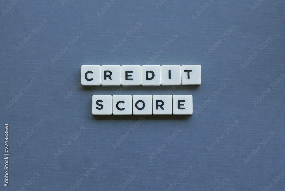 ' Credit Score ' word made of square letter word on grey background ...