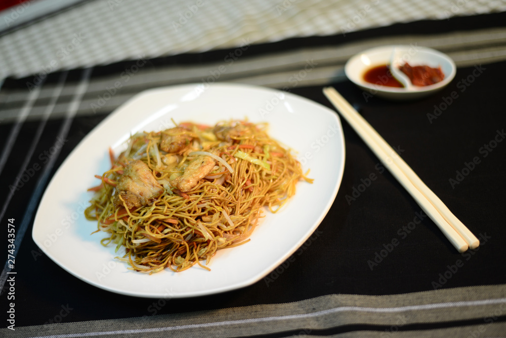 Singapore style fried rice noodle, setup nicely on a table ready to ...