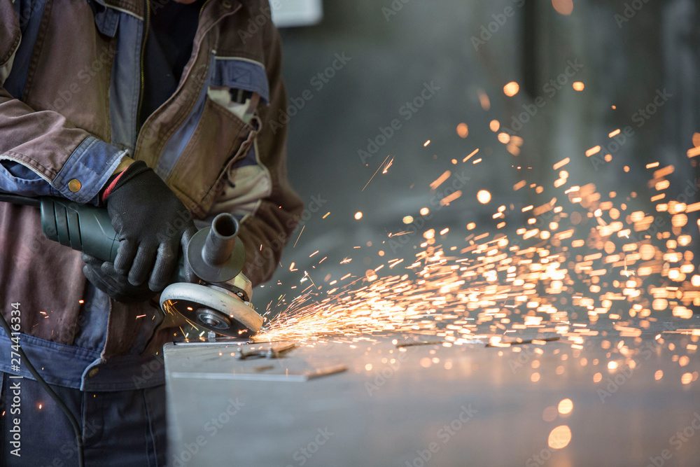 Grinding of materials in metallurgy workshop Stock Photo | Adobe Stock