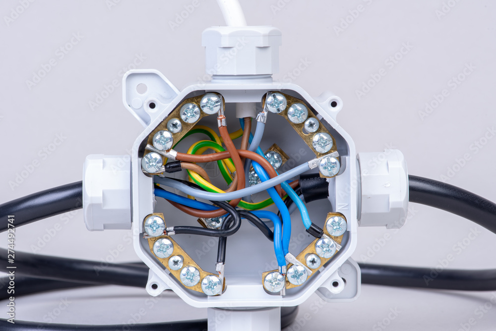 Plastic electrical box used in the electric installation process Stock ...