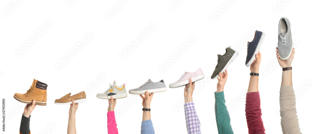 Set of people holding different stylish shoes on white background ...