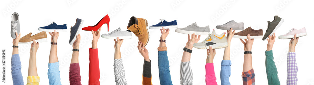 Set of people holding different stylish shoes on white background ...