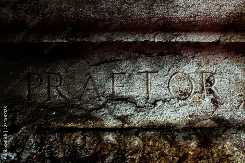 Old Latin writing on the walls of an ancient Roman gladiator arena in ...