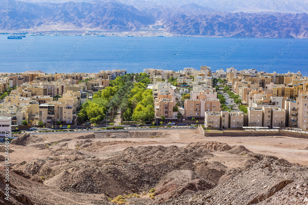 aerial photography of rest city on Red sea bay coast line with small ...