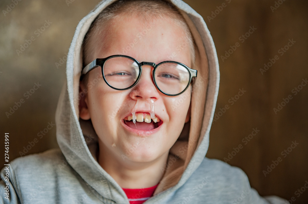 Cute little boy from school for children with poor eyesight holds ...