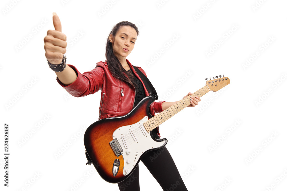 Young girl with a guitar showing thumbs up Stock Photo | Adobe Stock