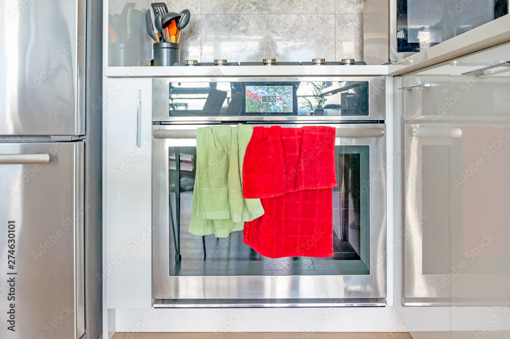 Contemporary, modern chrome stove and oven range, with color screen ...