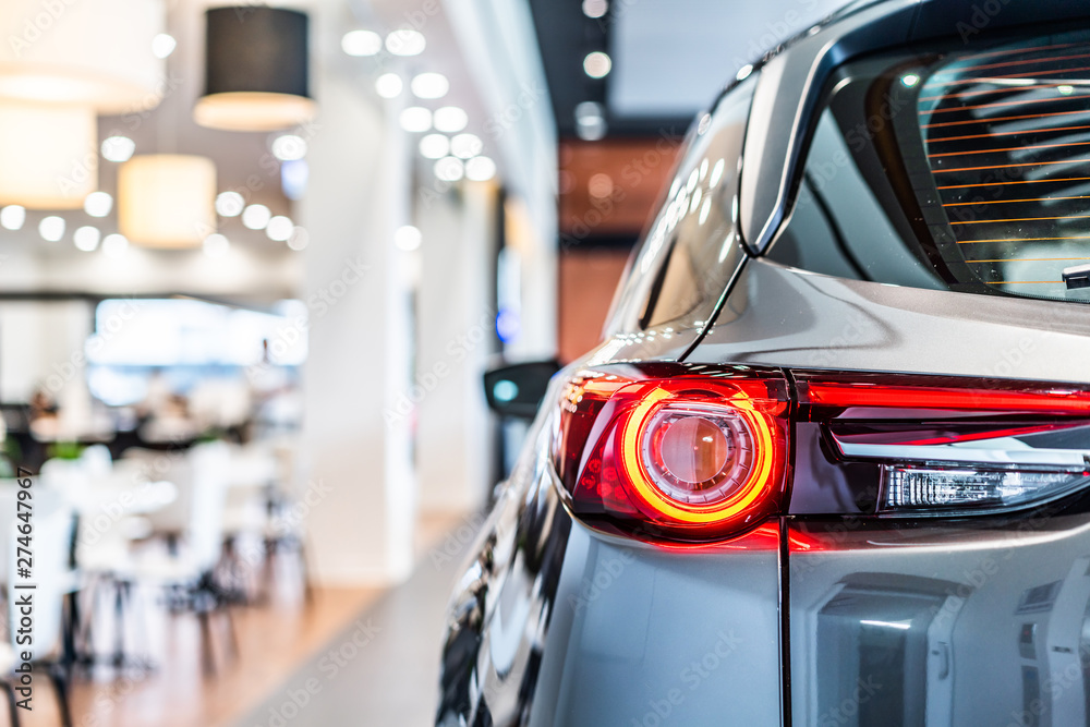 modern car led tail lights in showroom Stock Photo | Adobe Stock