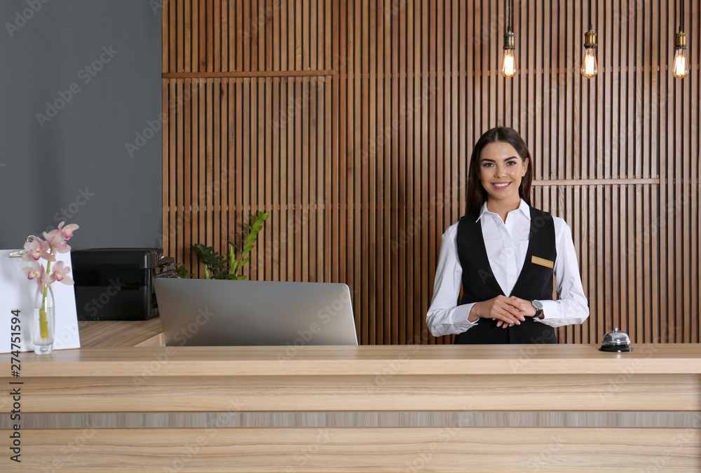 Portrait of receptionist at desk in lobby Stock Photo | Adobe Stock