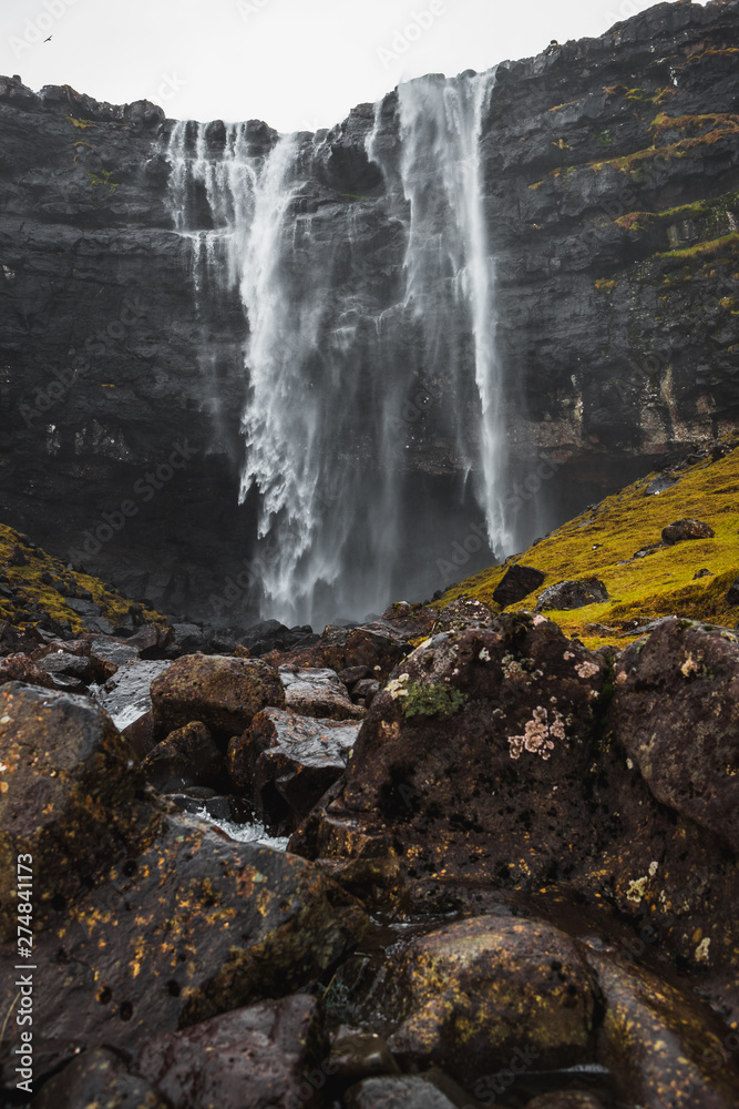 Fossa, the largest waterfall on the Faroe Islands, as seen during early ...
