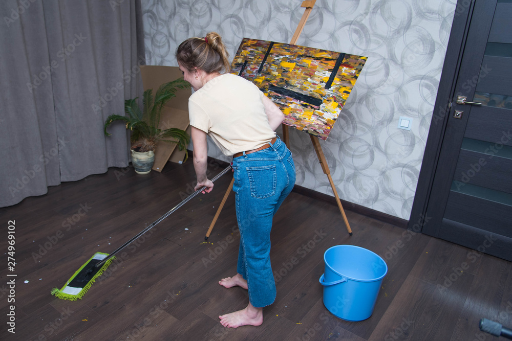 Happy teenage girl cleaning home, singing, dancing and having fun, copy ...