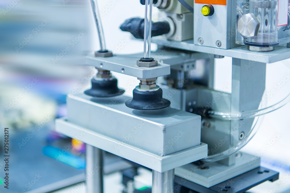 robotic pneumatic piston sucker unit on industrial machine,automation ...