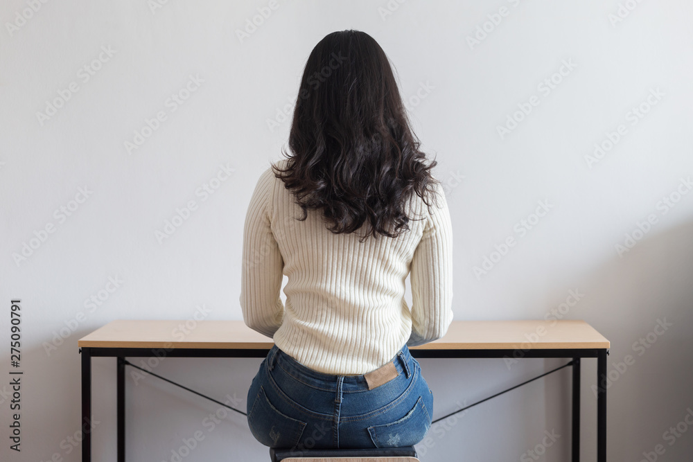 Woman Sitting In Chair Back