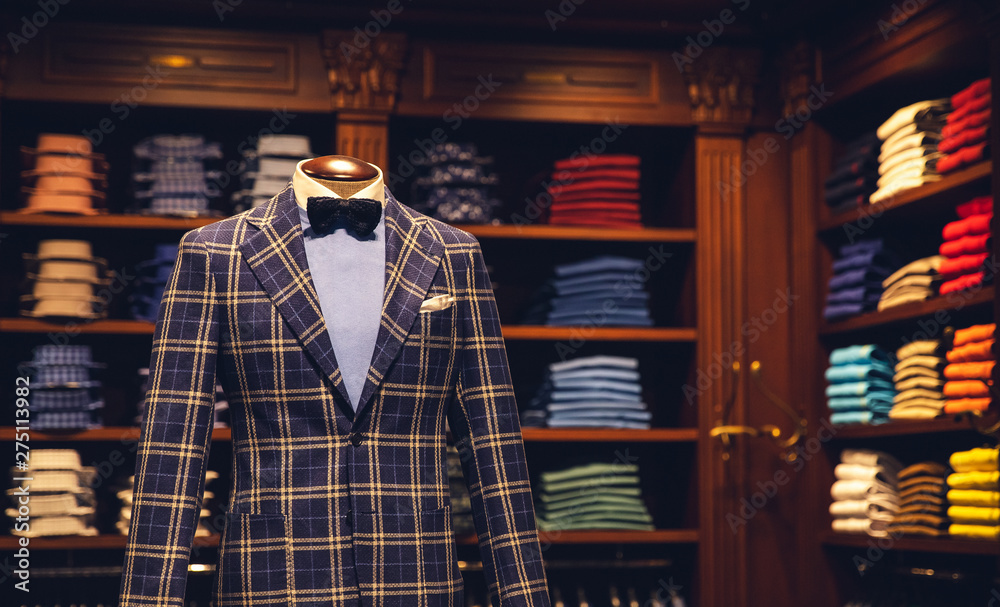 Men clothing store, suit with shirt and bow tie on mannequin Stock ...