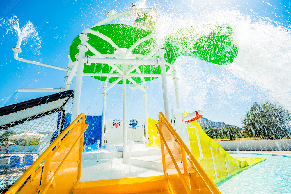 Children's water playgrounds and flip-flops with flowing, falling and ...