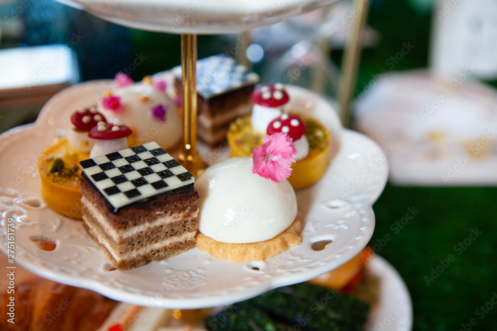 Magical and colorful set of afternoon tea in Alice in Wonderland theme ...