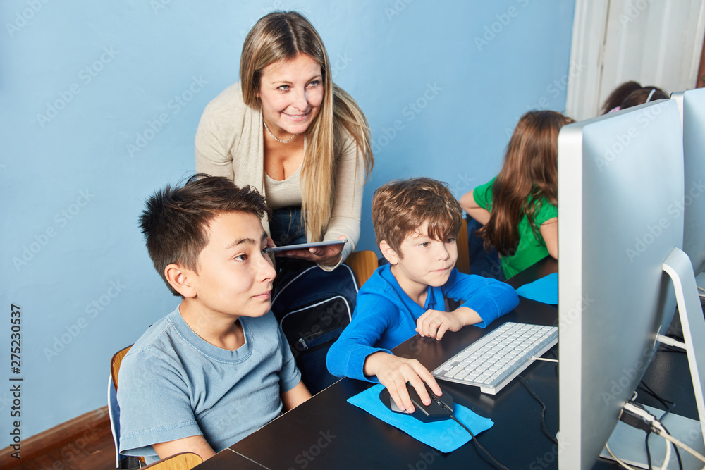 Children learn instruction in computer science Stock Photo | Adobe Stock