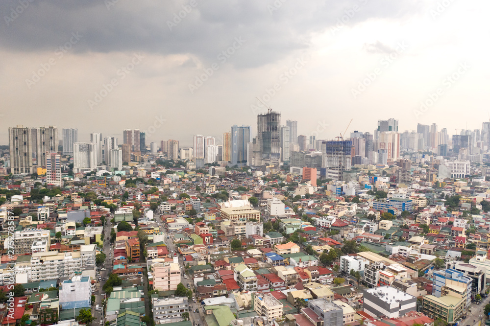Residential areas and streets of Manila, Philippines, top view. Roofs ...