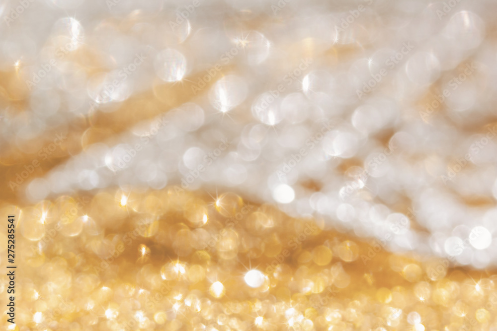 Gold and white shiny festive background. Shiny golden and silver ...