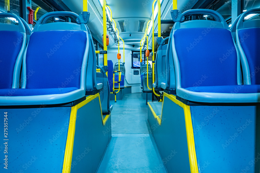 Interior of modern passenger bus. Passage between the rows of passenger ...