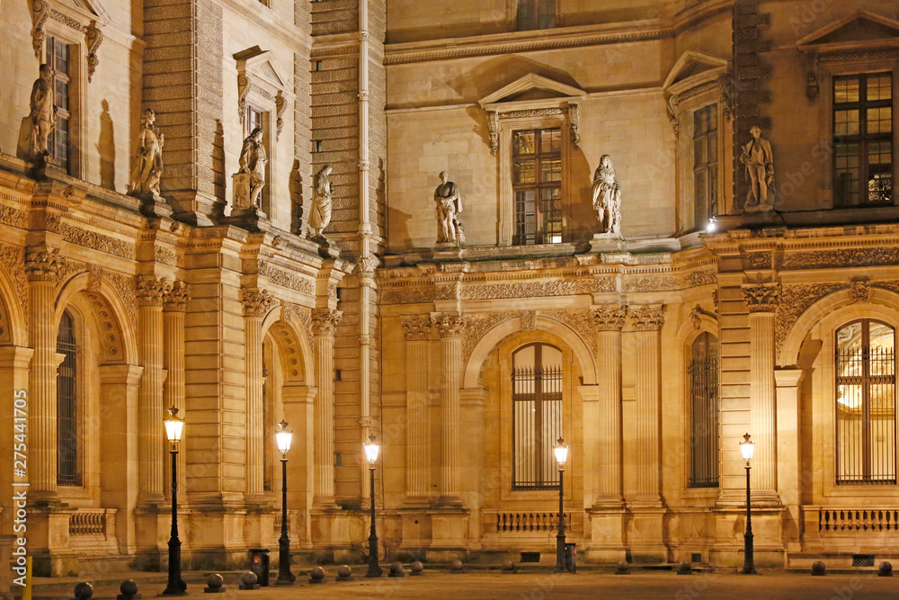 Paris. 1st district. Louvre Museum by night. Facades of pavilions Sully ...