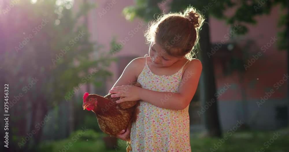 Vidéo Stock Authentic moment of happy little smiling girl is holding a ...