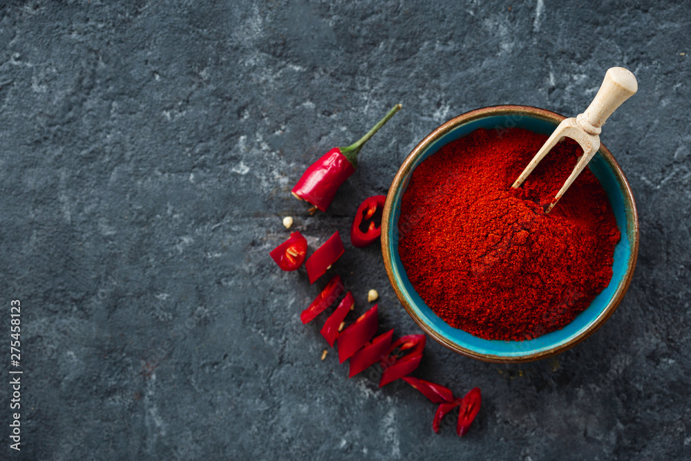 Chili pepper powder on dark background with copy space top view Stock ...