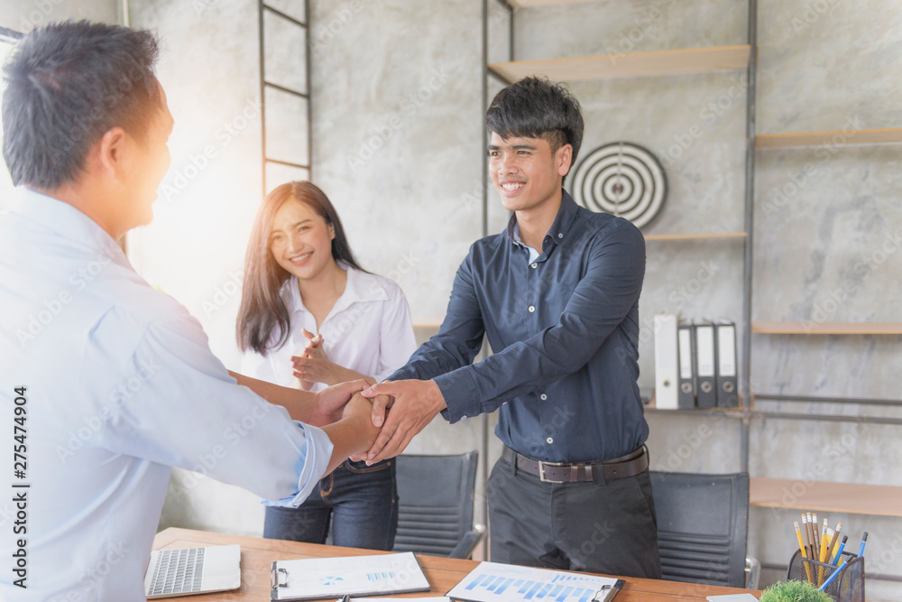 Handing a greetings, putting both hands in the hands of another person ...