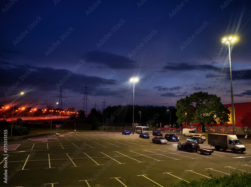 Almost empty night car parking background hd Stock Photo | Adobe Stock
